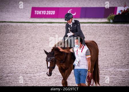 Belgian jockey Barbara Minneci and Groom Guillaume Antoine pictured ...