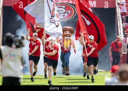 The San Francisco 49ers mascot Sourdough Sam waves the flag before ...