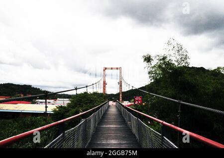 Tamparuli Suspension Bridge, decorated with Linangkit weaving pattern ...