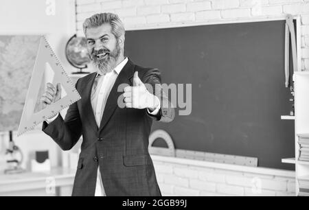 Final examination designed test learning outcomes. Teacher explaining ...