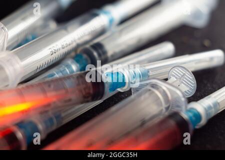 Closeup shot of a bunch of new unused syringes Stock Photo - Alamy