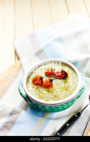 Bio tomatoes on blue white dish towel Stock Photo - Alamy
