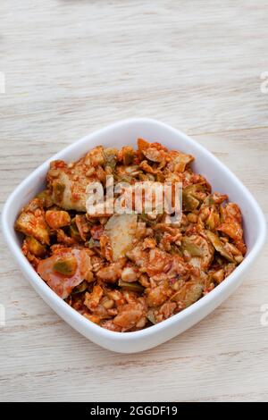 Traditional spicy green mango achar Stock Photo - Alamy