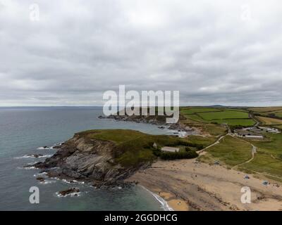 aerial drone around church cove and mullion golf course cornwall uk ...