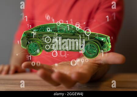 3D rendered hologram of a car and binary numbers hovering with a hand ...