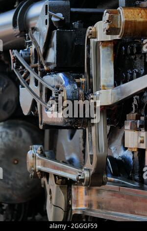 Drive wheel and piston rods of a rail road steam engine Stock Photo - Alamy