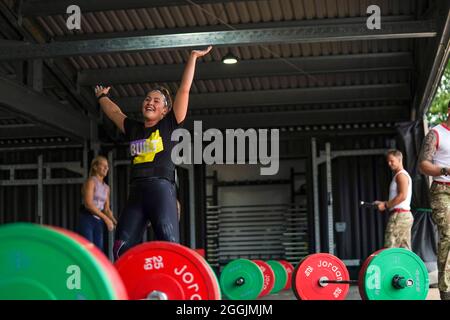 A soldier competes in the weightlifting task during the British Army ...