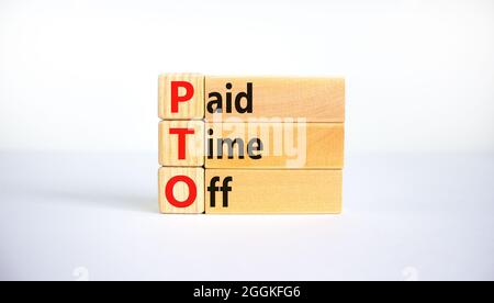 PTO, Paid time off symbol. White and yellowpaper with concept words ...