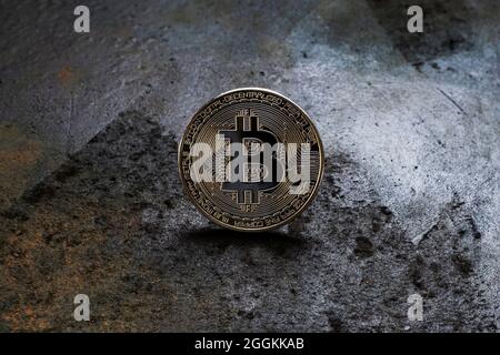 Bitcoin logo coin on rusty metal background Stock Photo - Alamy
