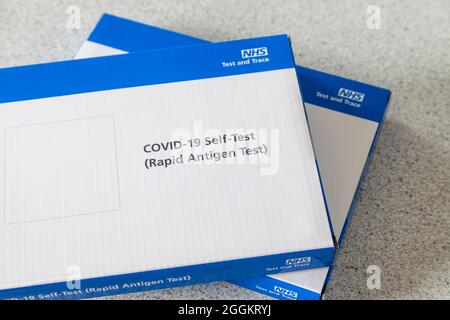 Boxes of NHS Covid-19 rapid antigen test (lateral flow self test) kits ...