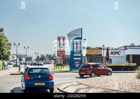 Large sign at the entrance to a British Retail park in Rustington, West ...