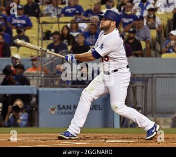 Los Angeles Dodgers' Max Muncy hits a single during the second inning ...