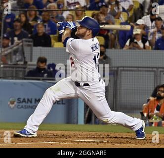 Los Angeles Dodgers' Max Muncy runs during the third inning of a spring ...
