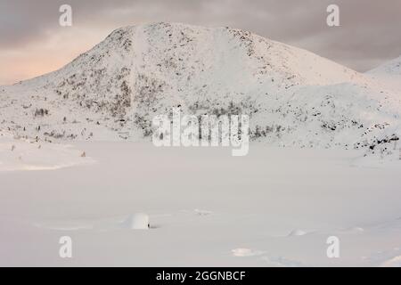 Winter landscape near Dinglavatnet lake. Beautiful sunset over ...