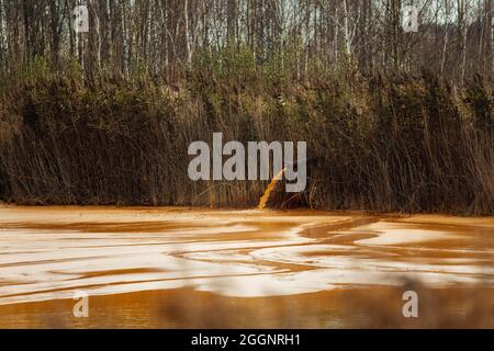 Industrial wastewater, the pipeline discharges liquid industrial waste ...
