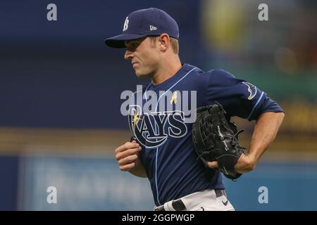 Tampa Bay Rays relief pitcher Chaz Roe (52) stretches after reporting ...