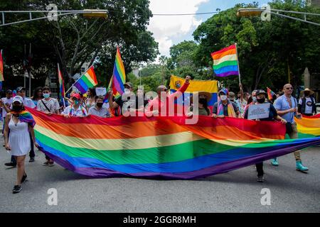 Caracas, Venezuela. 02nd Sep, 2021. Two young men kiss during an LGBTI ...
