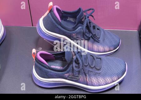 MULTICOLOR SHOES ON DISPLAY AT SKECHERS FASHION STORE Stock Photo - Alamy