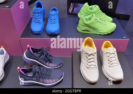 MULTICOLOR SHOES ON DISPLAY AT SKECHERS FASHION STORE Stock Photo - Alamy