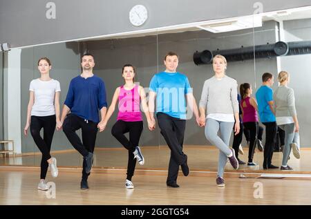 People fulfilling Celtic dance movements Stock Photo - Alamy