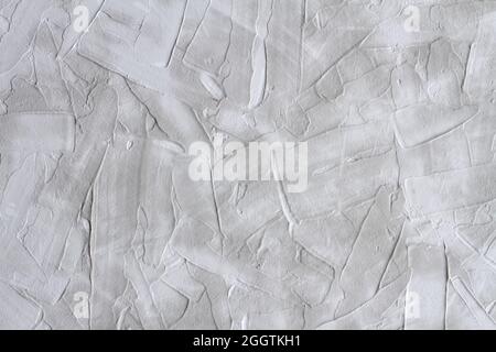 Gray grooved stucco on wall. Plaster patterned texture or background ...