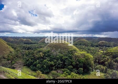 Unique place. Chocolate Hills, Bohol, Philippines. Blue sky with clouds ...