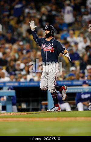 Atlanta Braves shortstop Dansby Swanson bobbles the ball after fielding ...