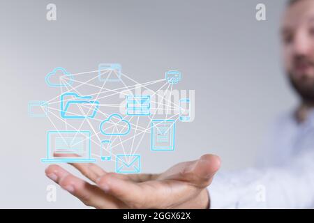 Person presenting a 3D render of cloud computing elements Stock Photo ...