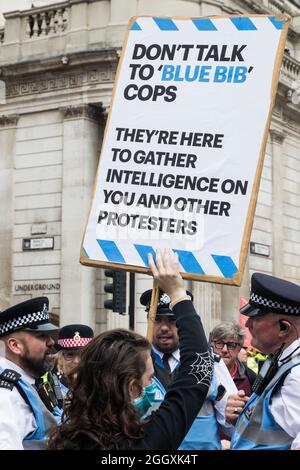 Police liaison officers wearing new light blue high-vis jackets and ...