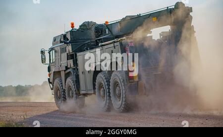 MAN SX45 32.430 RHD 8x8 Recovery Truck preprares to crane a Bulldog ...