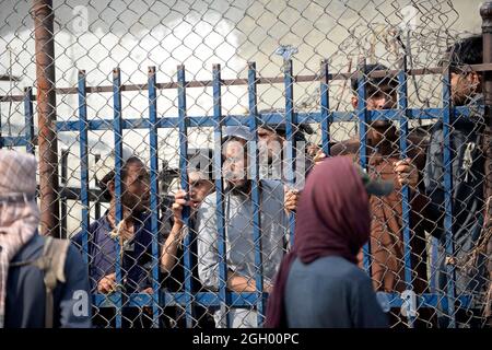 Torkham. 3rd Sep, 2021. Afghans cross border at the border crossing ...