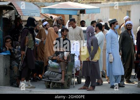 Torkham. 3rd Sep, 2021. Afghans cross border at the border crossing ...