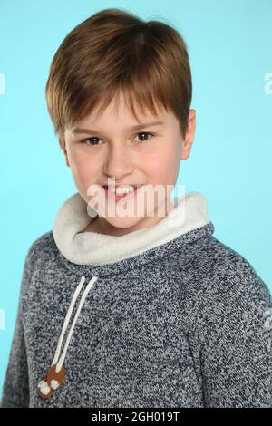 Talented little boy. Handsome talented little boy standing near drawing ...