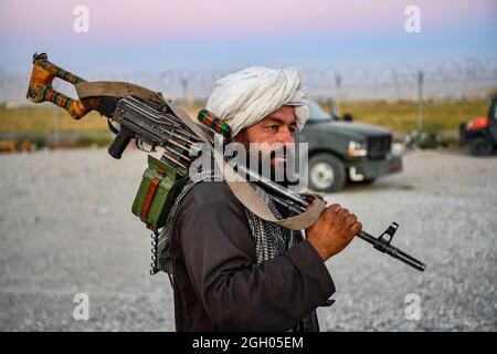 Taliban patrol in Bagram air base on September 1, 2021. Bagram, the ...