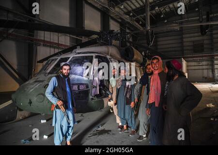 Taliban patrol in Bagram air base on September 1, 2021. Bagram, the ...