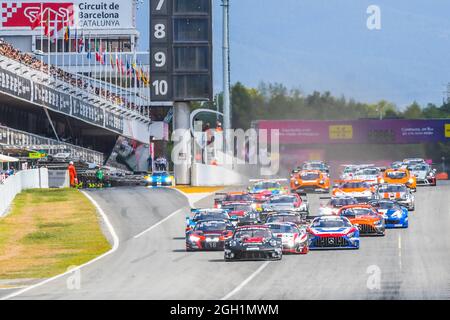 BARCELONA, SPAIN - Sep 04, 2021: A driver on the beach looking at the views of Barcelona beach ...