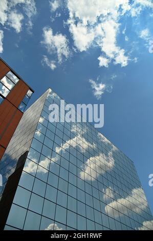 TUR, ITALY - Aug 08, 2021: A vertical shot of a modern building glass ...