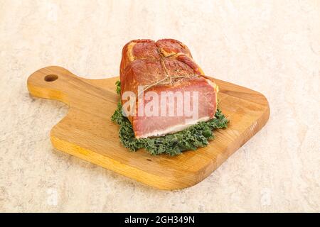 Delicous pork cured meat isolated over board Stock Photo - Alamy