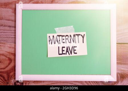 Conceptual caption Maternity Leave. Word Written on the leave of ...
