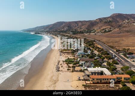 USA California Los Angeles Beachfront houses with sea defenses against ...