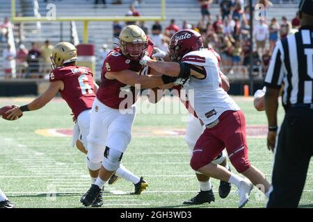 Boston College offensive lineman Ozzy Trapilo speaks during a press ...