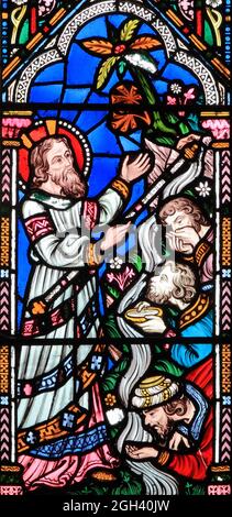 Moses strikes water from the rock. Moses strikes water from a rock with ...