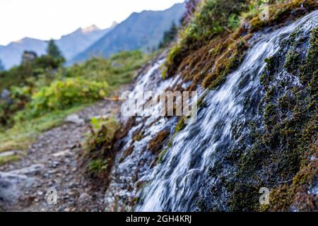 Cristal clear alpine stream with fresh water in the Austrian Alps Stock ...
