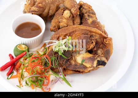 crispy pata, deep-fried pork knuckle Stock Photo - Alamy