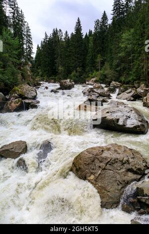 View of Weller Bridge over the Oetztaler Ache River, Oetz, Tyrol ...