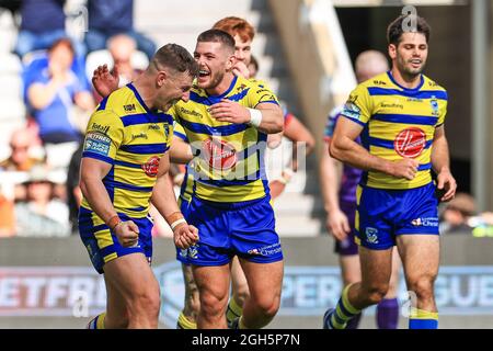 George William (31) of Warrington Wolves celebrates his try in, on 9/5 ...