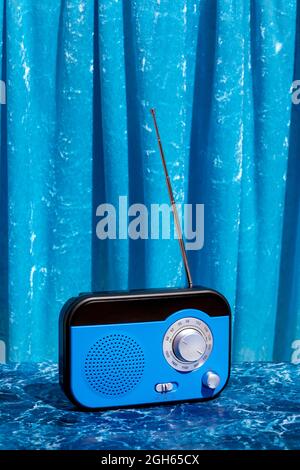 Vintage radio receiver on color background Stock Photo - Alamy