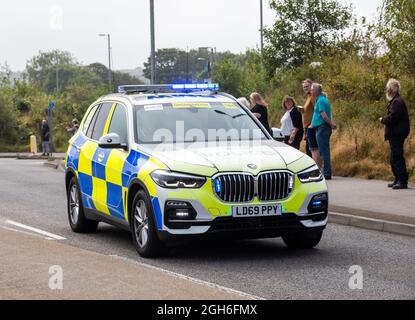 A Police car acting as a rolling roadblock during The Tour Of Britain ...