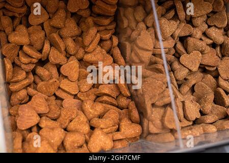 Bulk bin dog treats at a pet store. Bin full ofdog biscuit treats Stock ...