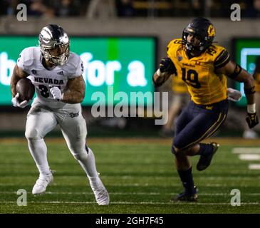 Nevada running back Toa Taua (35) runs for first down in the first ...